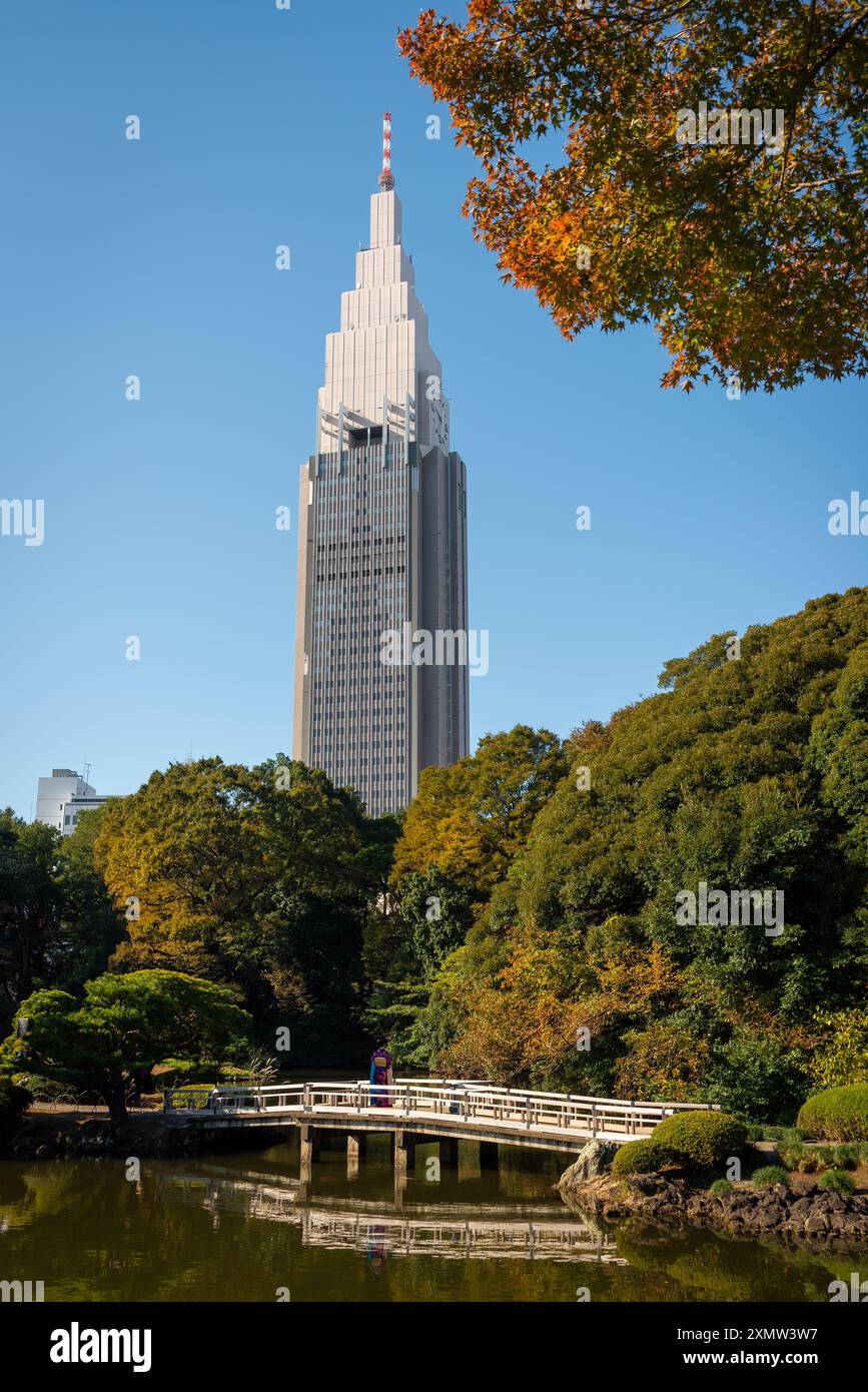 NTT Docomo Yoyogi Building rises above Shinjuku national garden Stock ...