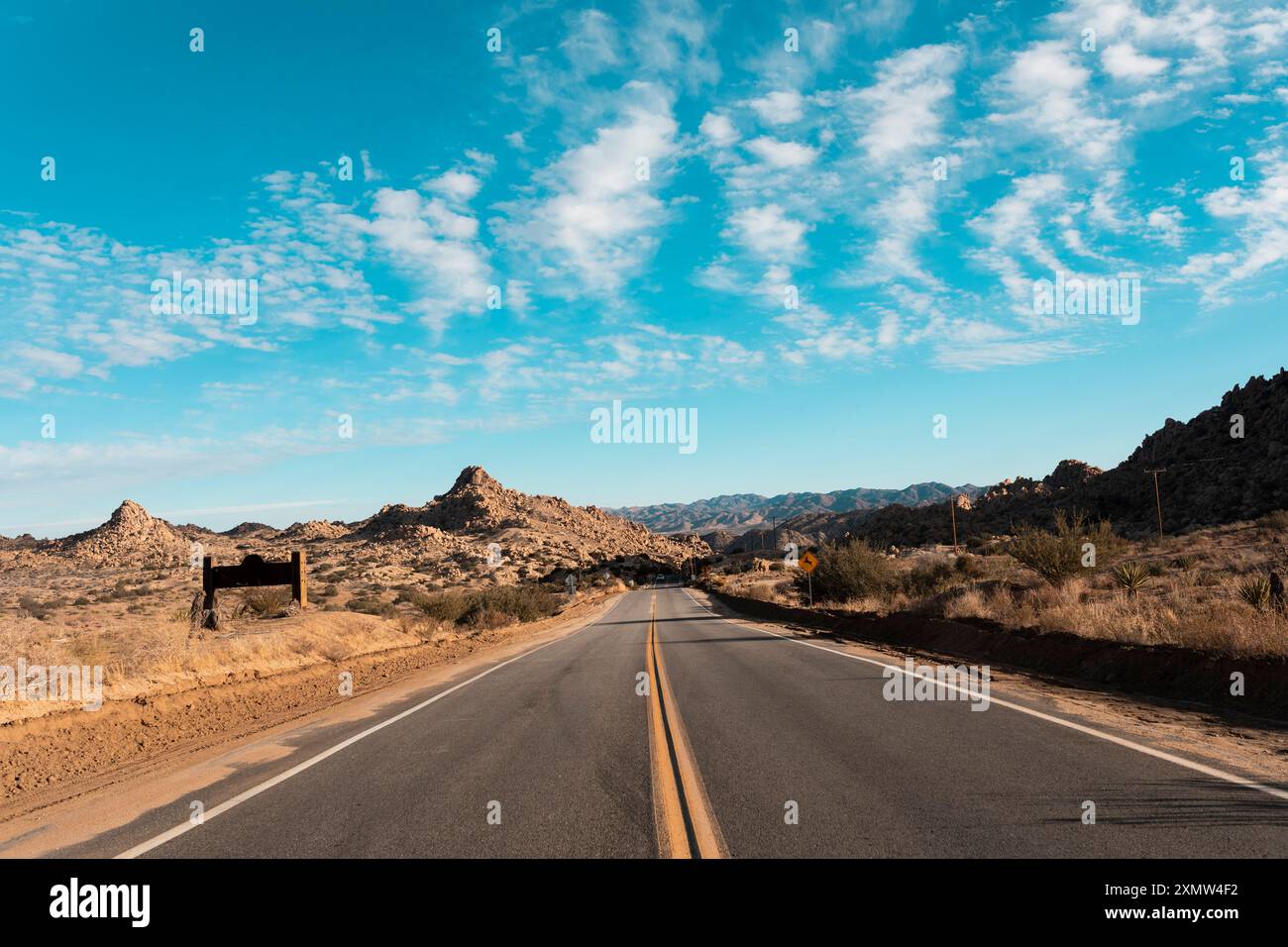 Ghost town exit. Long open road in the californian desert Stock Photo ...