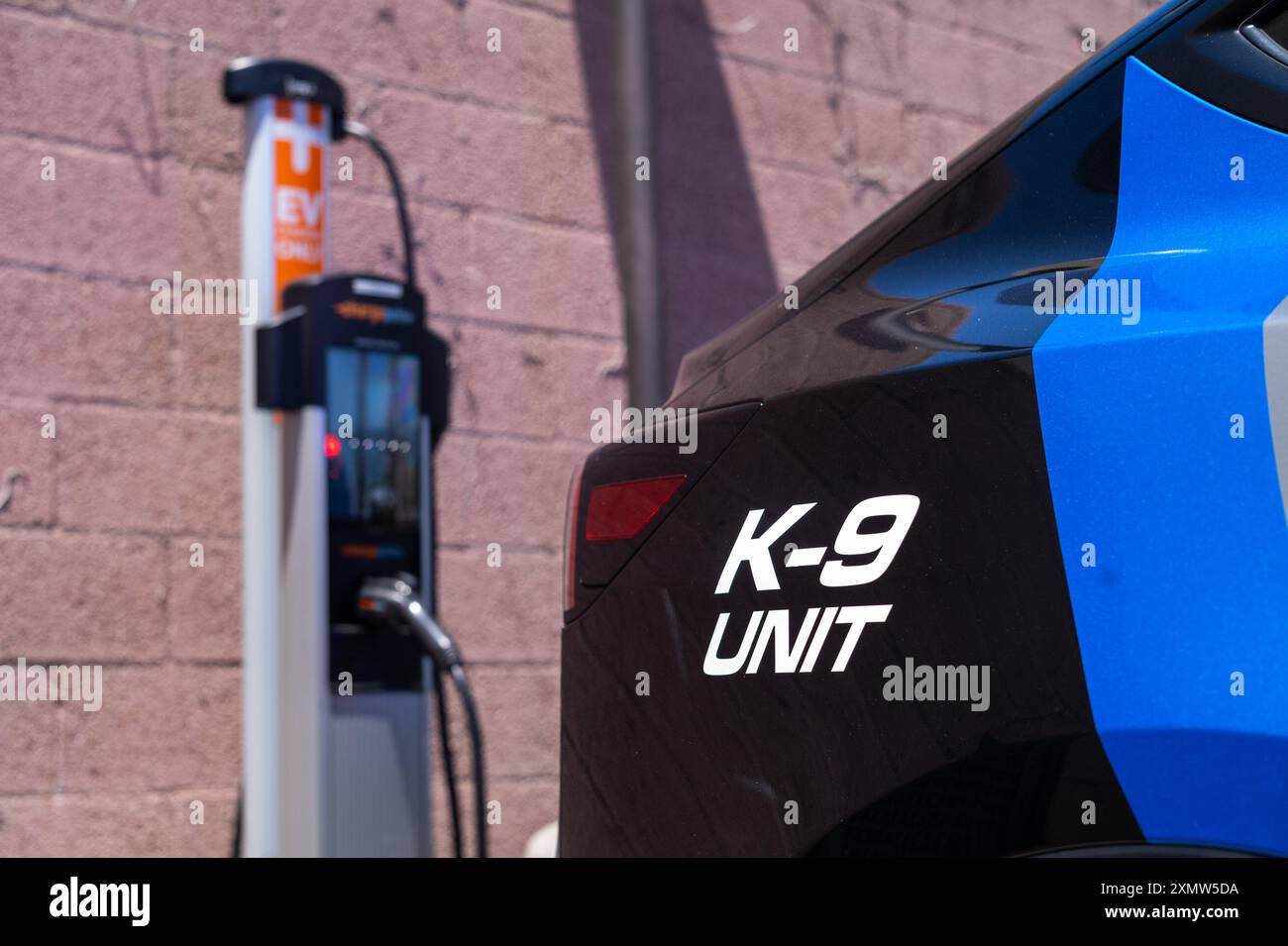 An all electric police vehicle made by Tesla is unveiled during a press ...