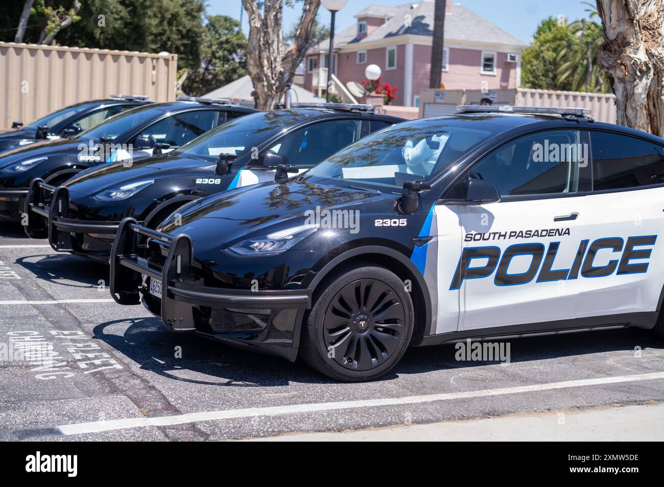 The all electric police vehicles made by Tesla are unveiled during a ...