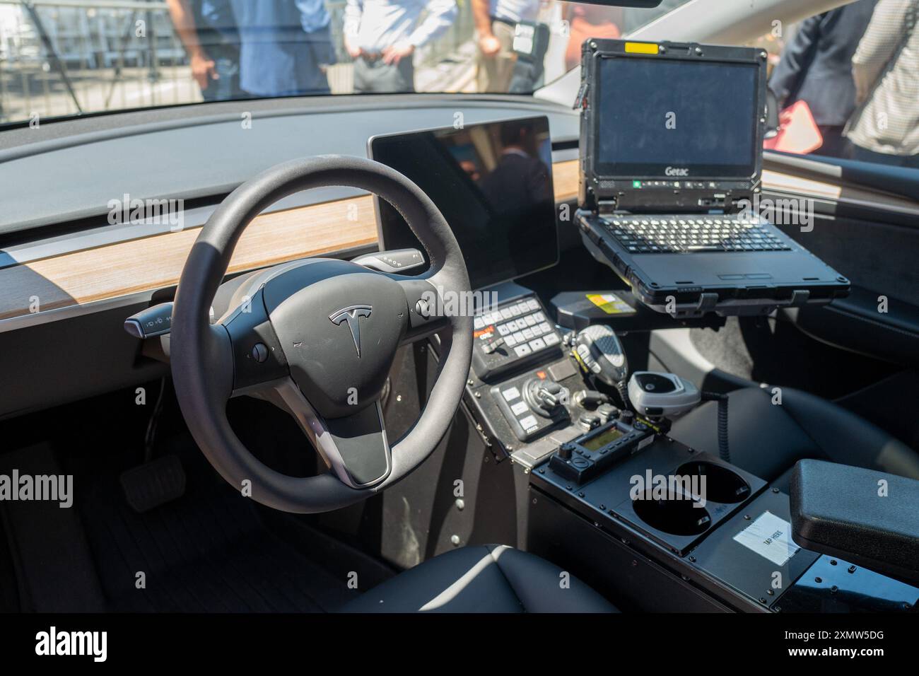 An all electric police vehicle made by Tesla is unveiled during a press ...