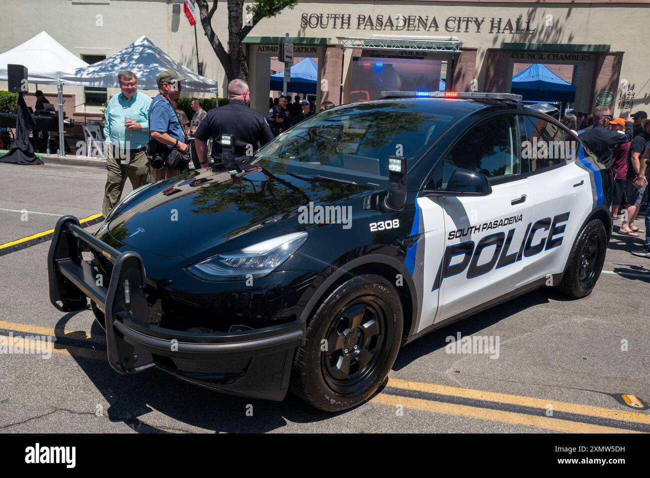 An all electric police vehicle made by Tesla is unveiled during a press ...