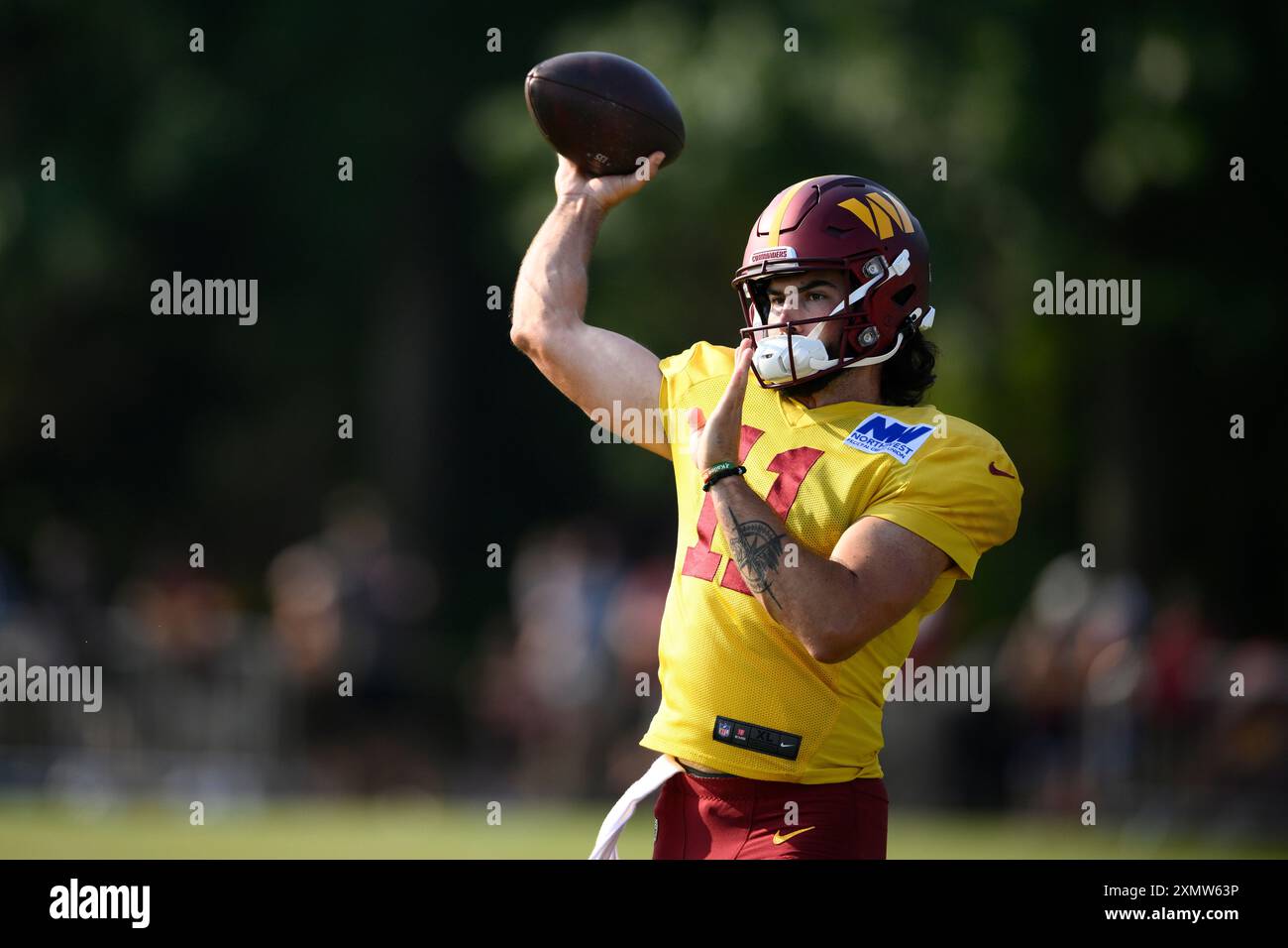 Washington Commanders quarterback Sam Hartman (11) works out during NFL ...