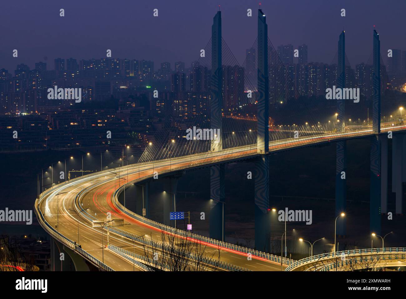 Night view of Chongqing CaiJia Bridge, accross Yangtze river in ...