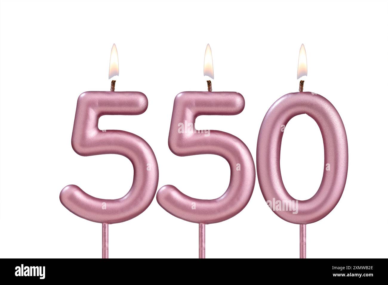Lit birthday candle - Candle number 550 on white background Stock Photo ...