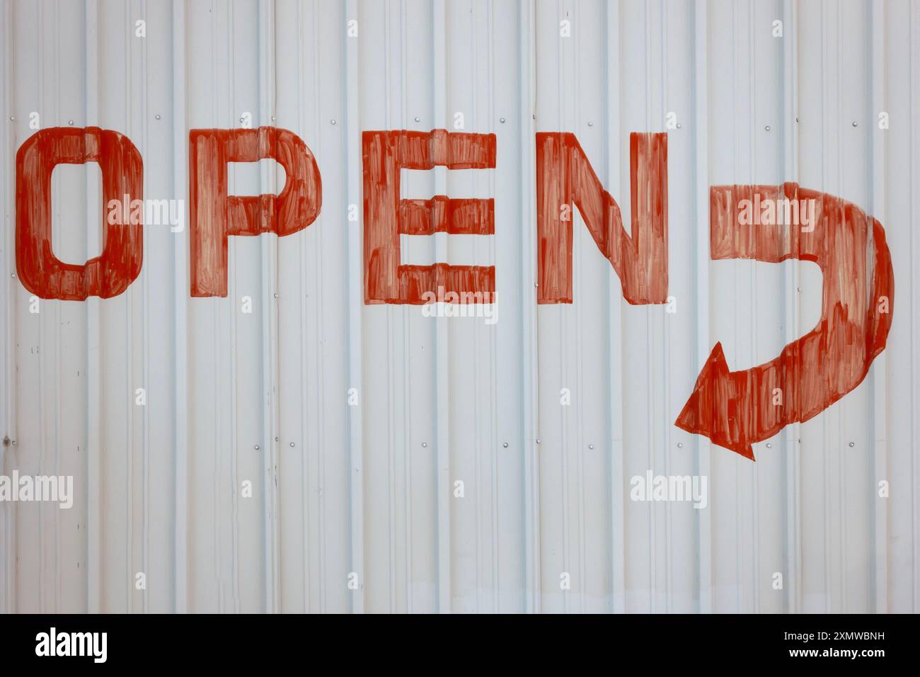 White arrow on red background hi-res stock photography and images - Alamy