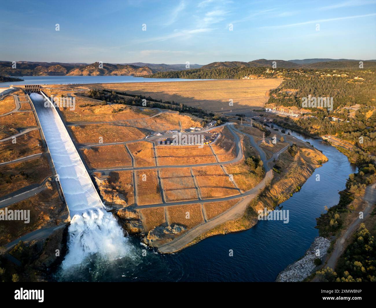 Aerial view of the Lake Oroville Dam with the new spillway in action ...