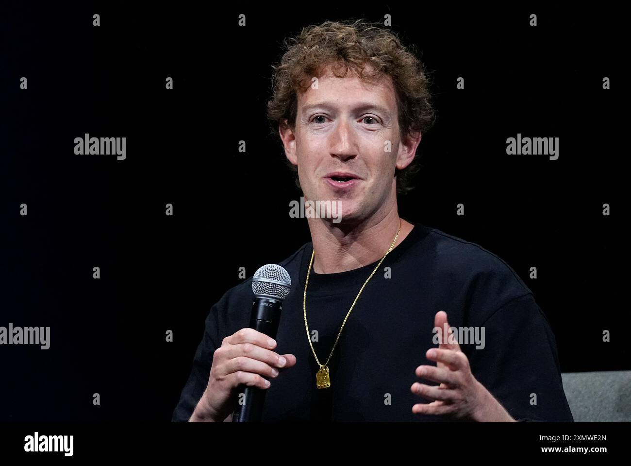 Mark Zuckerberg, chief executive officer of Meta, makes a point during ...