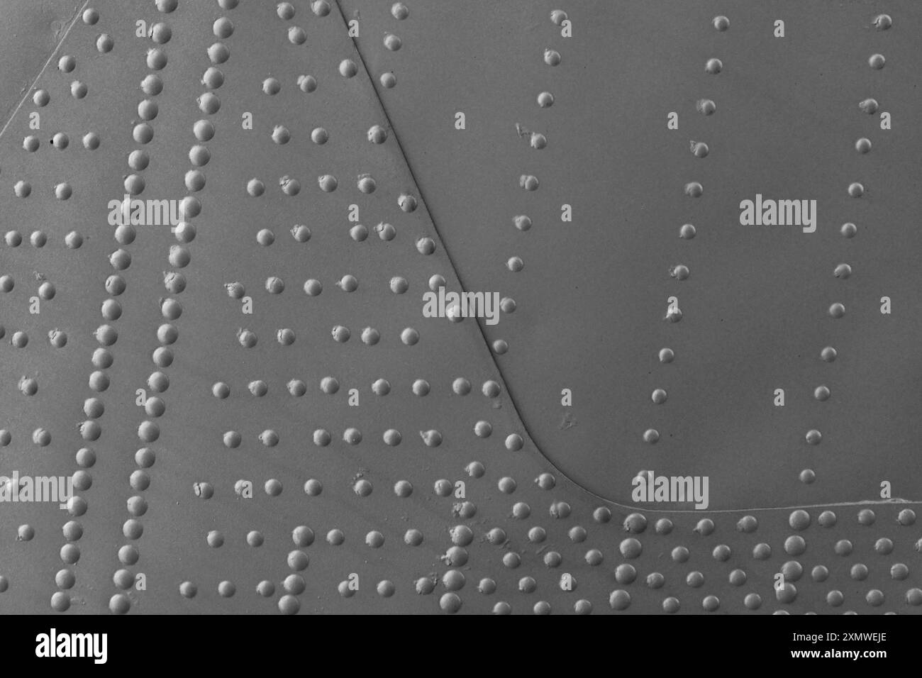 Abstract metal background with rivet patterns. Metal cladding surface ...