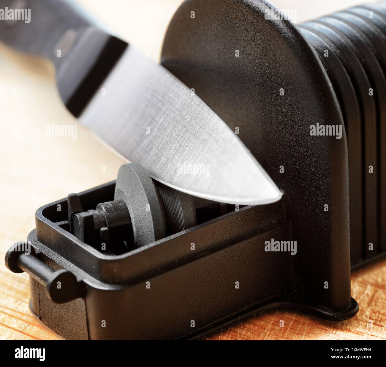 Sharpening the knife hi-res stock photography and images - Alamy
