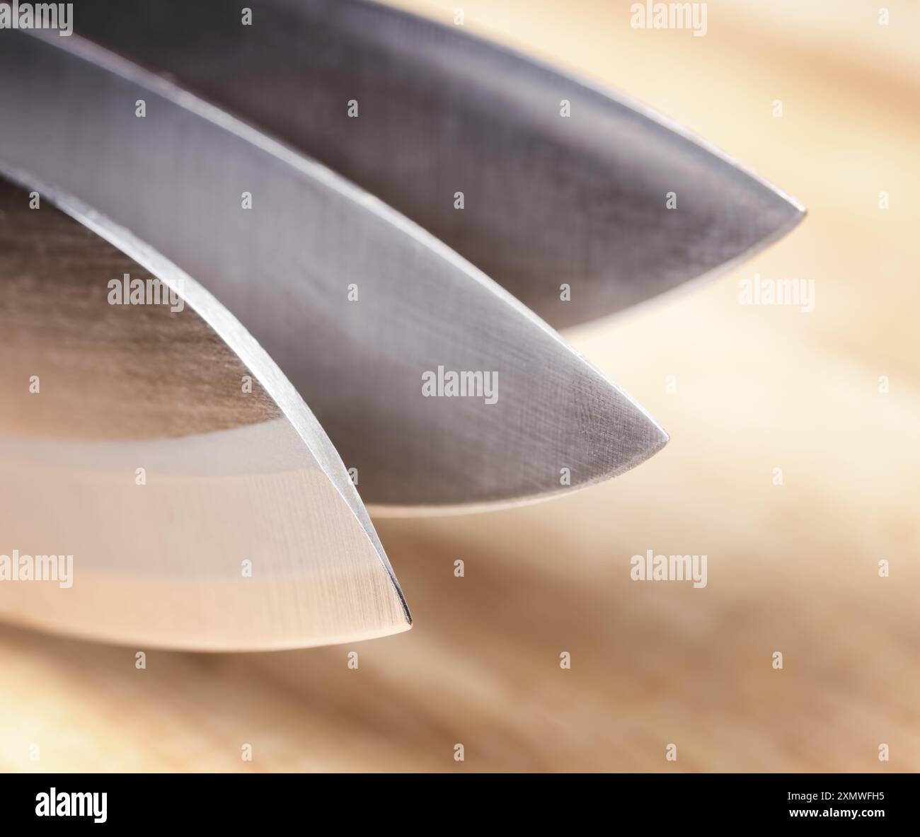 Metal sharp kitchen knives hi-res stock photography and images - Alamy