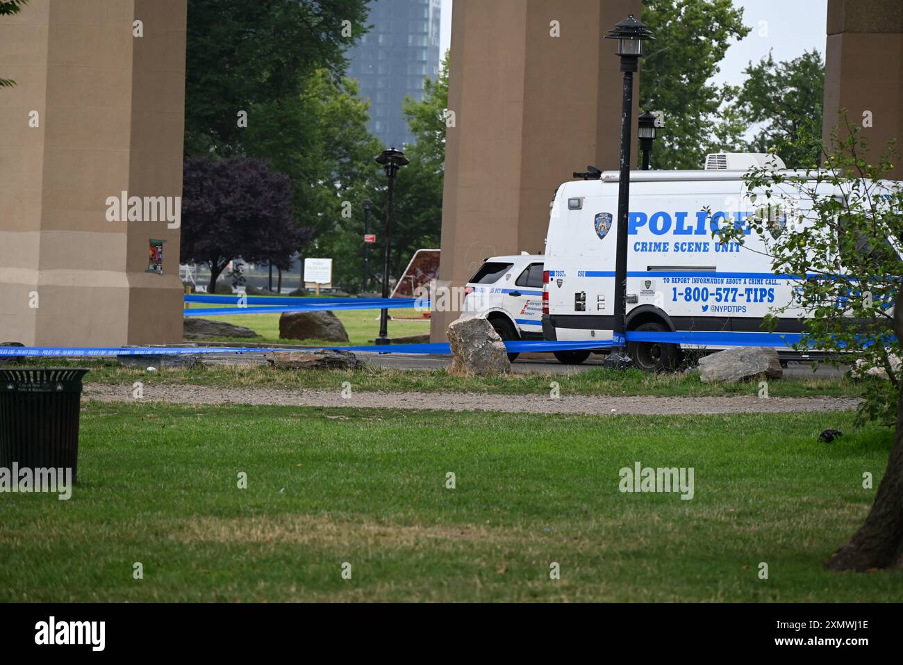 Crime scene investigators are canvassing the area and placing evidence ...