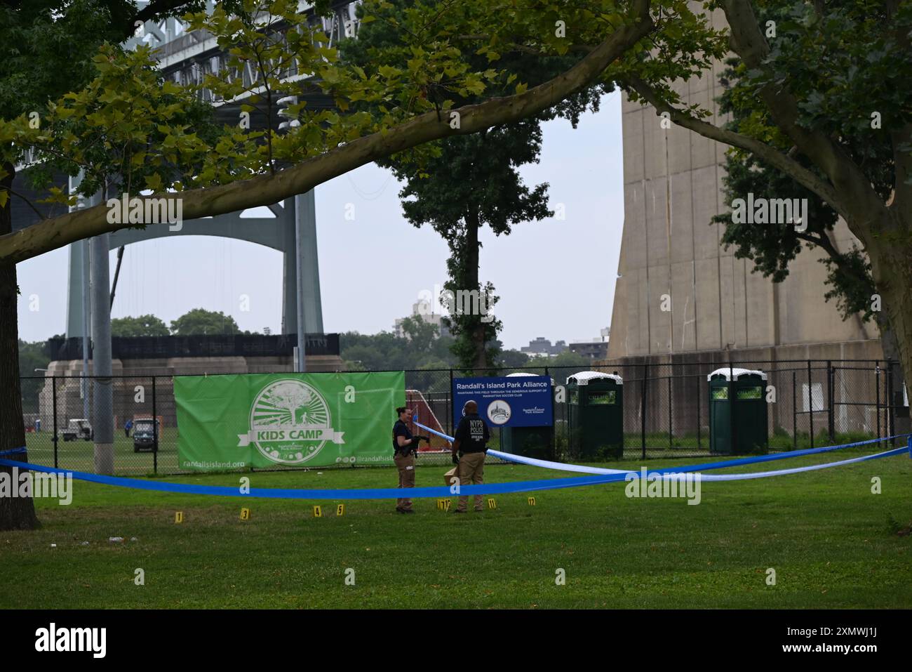 Crime scene investigators are canvassing the area and placing evidence ...