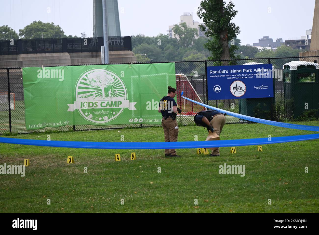 Crime scene investigators are canvassing the area and placing evidence ...