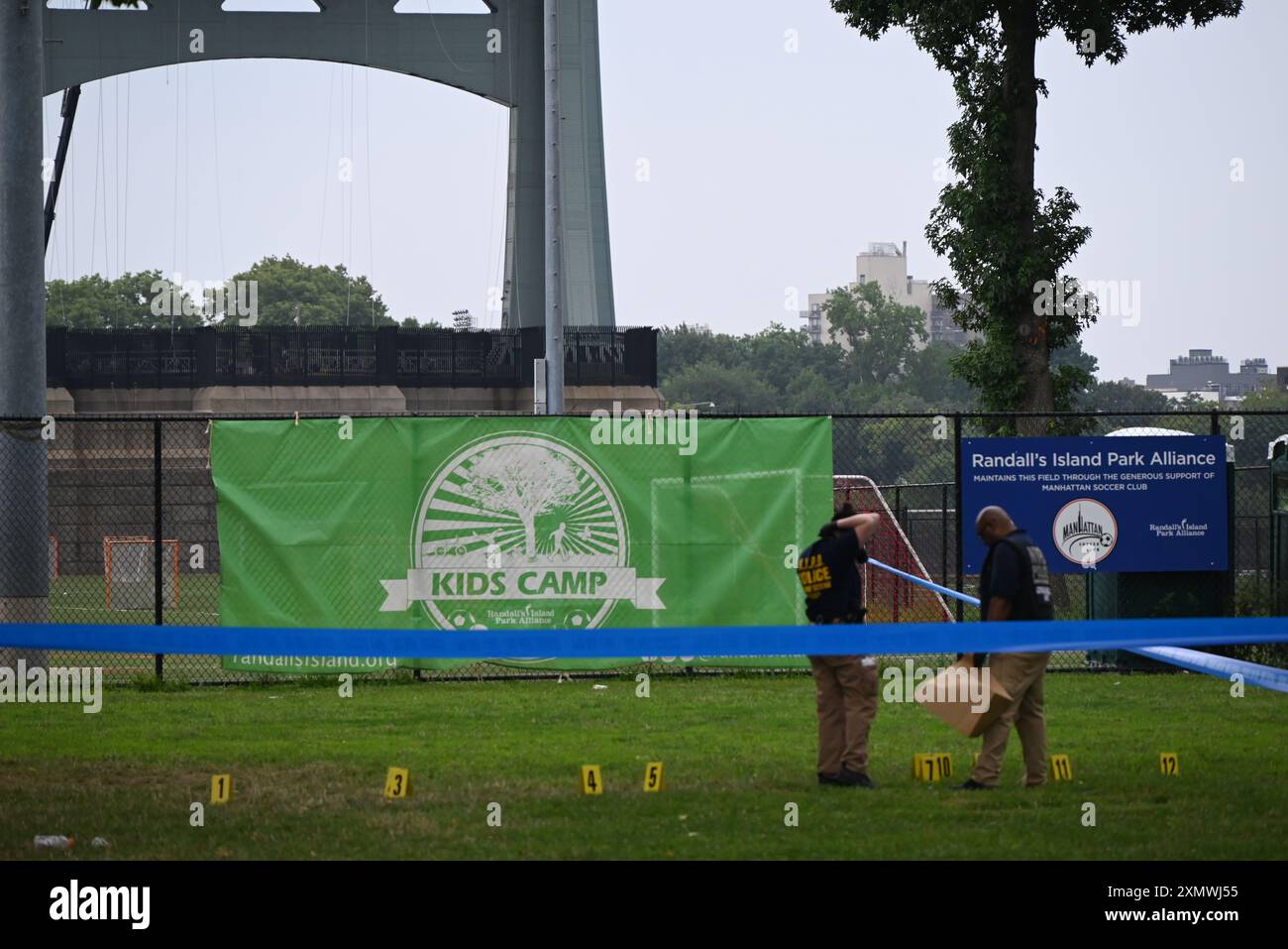 Crime scene investigators are canvassing the area and placing evidence ...