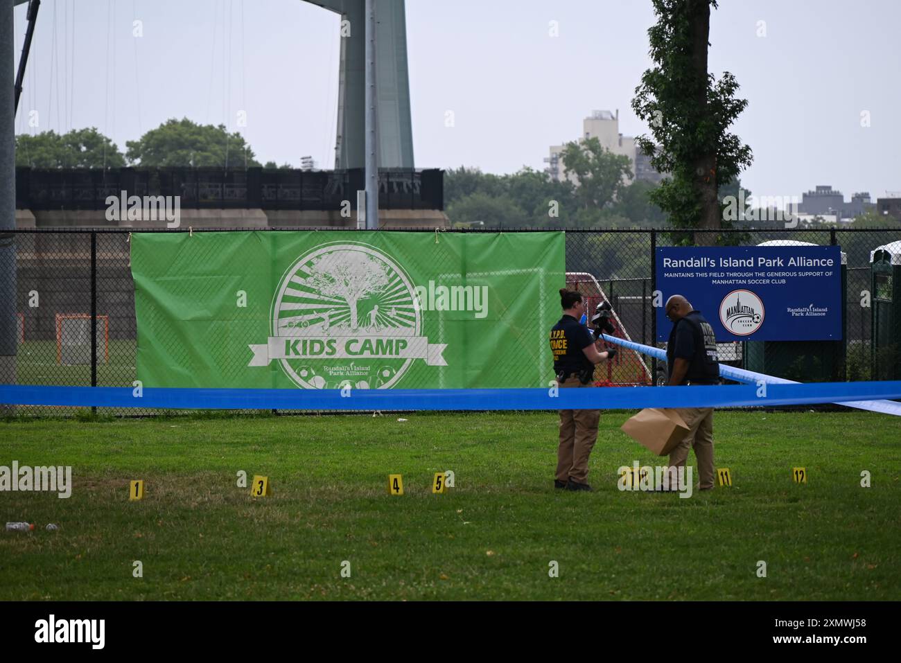 Crime scene investigators are canvassing the area and placing evidence ...
