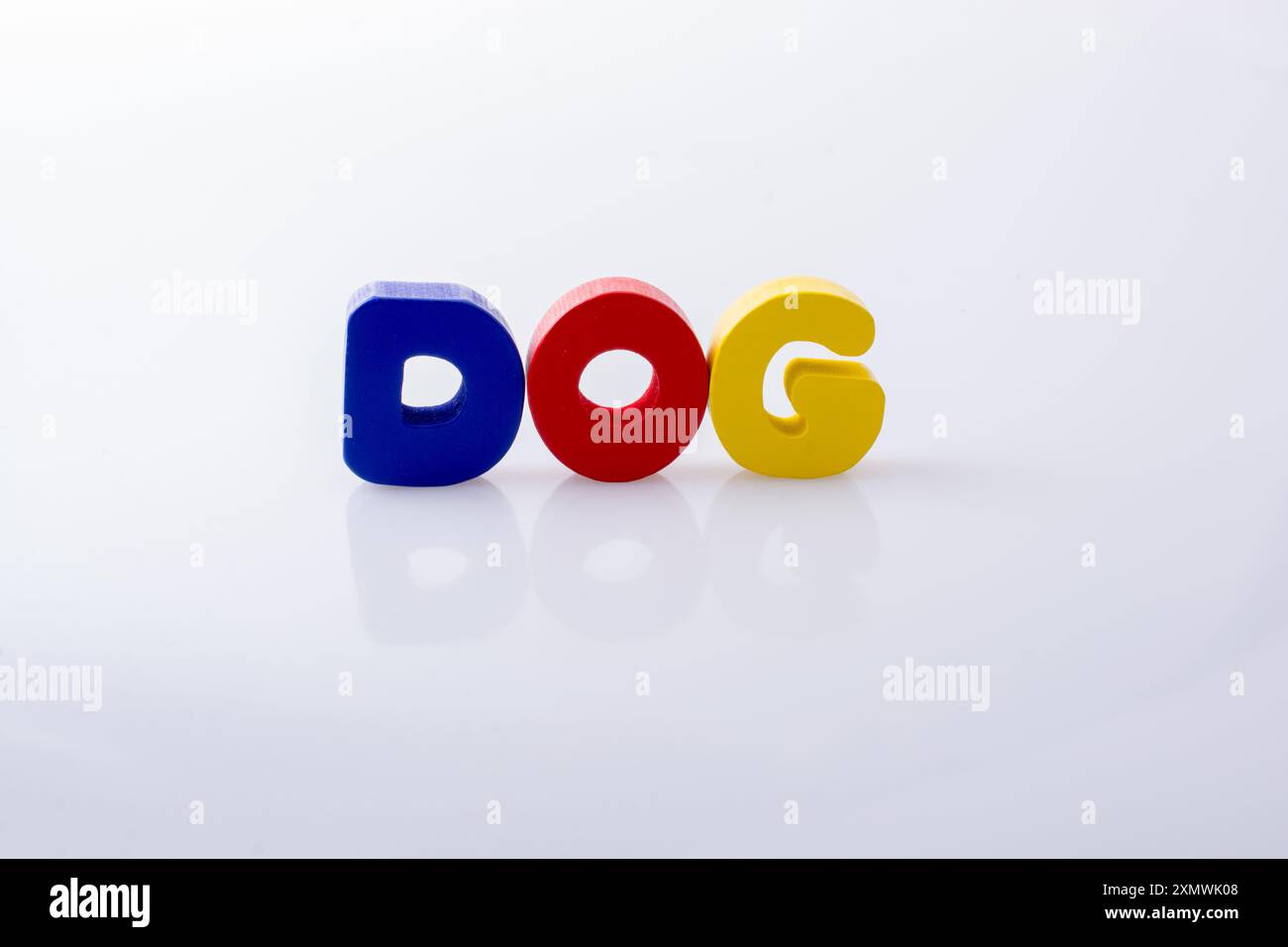 the word DOG written with colorful letter blocks on white Stock Photo ...