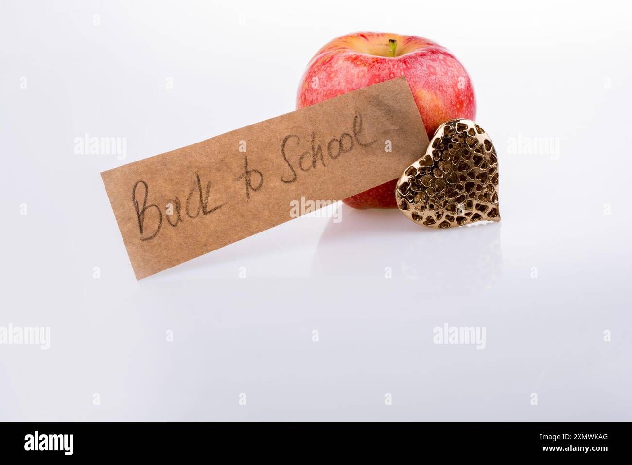 Back to school theme with a heart Stock Photo - Alamy