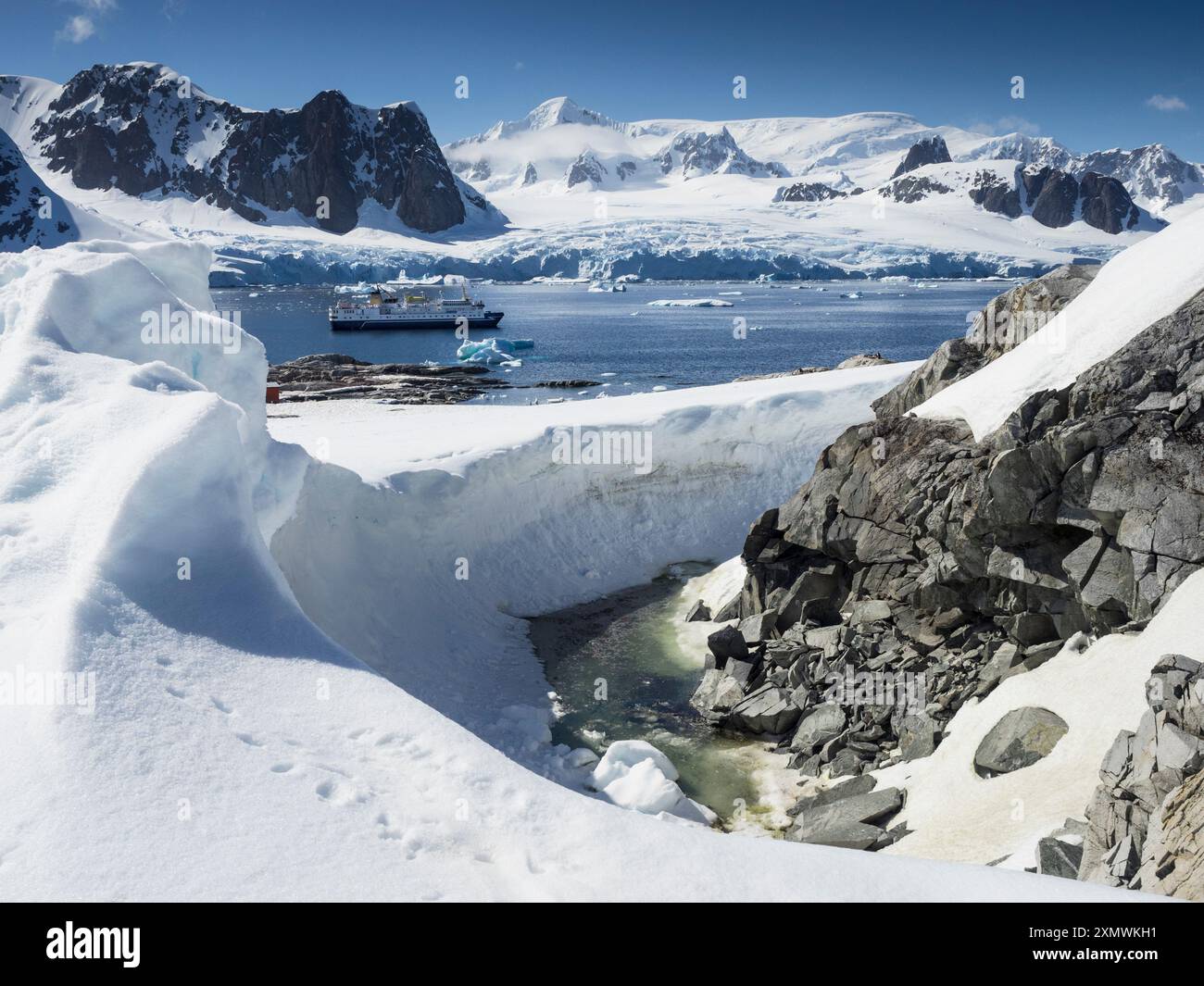 Cruise ship Ocean Nova off Petermann Island, Wilhelm Archipelago ...