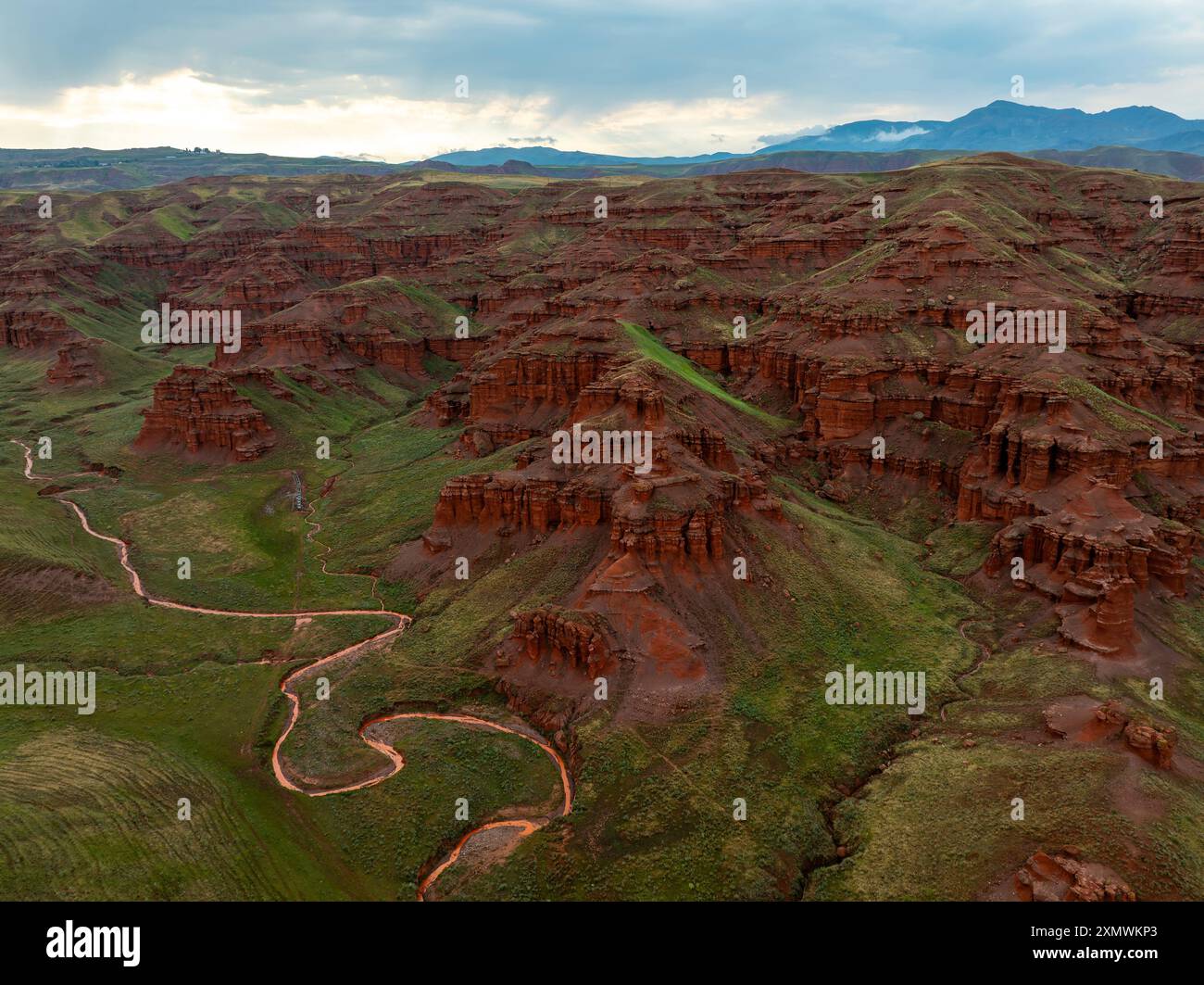 Red fairy chimneys shaped like formations that are millions of years ...