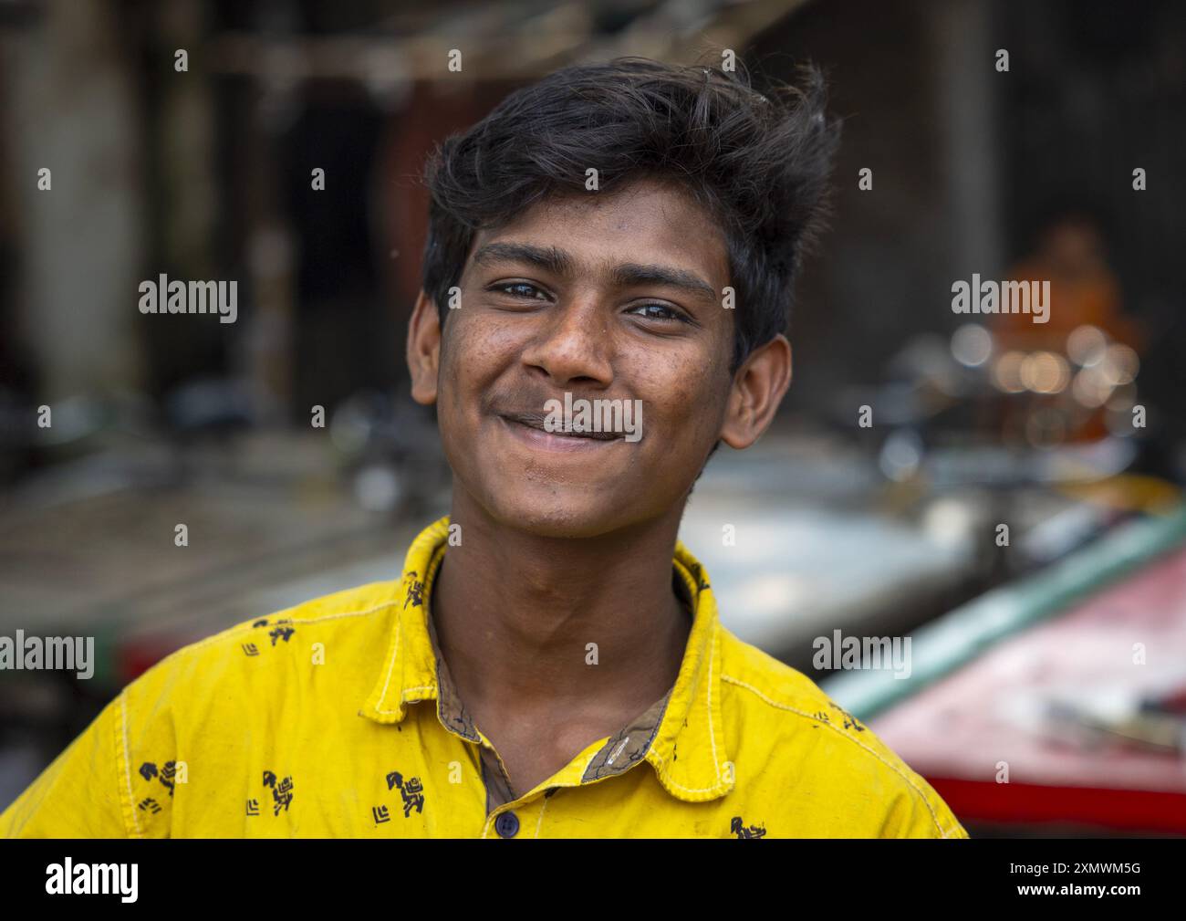 Portrait of a bangladeshi young man with yellow shirt, Dhaka Division, Dhaka, Bangladesh Stock ...