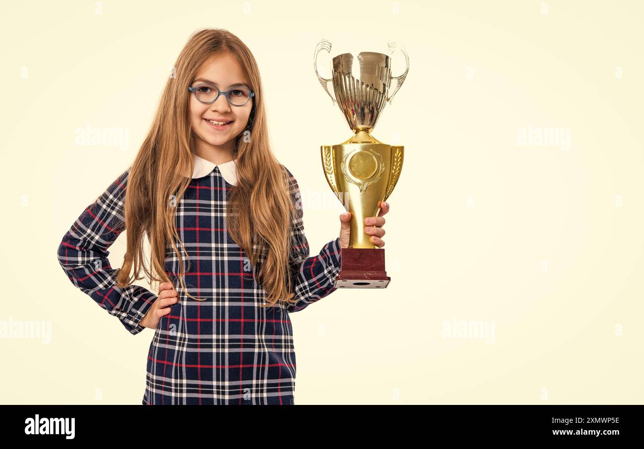 photo of happy excellent school girl with award. excellent school girl with award isolated on ...
