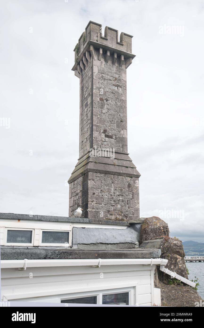 Chimney corner Castle St Beaumaris.Chimney stack on sea wall at rear of ...