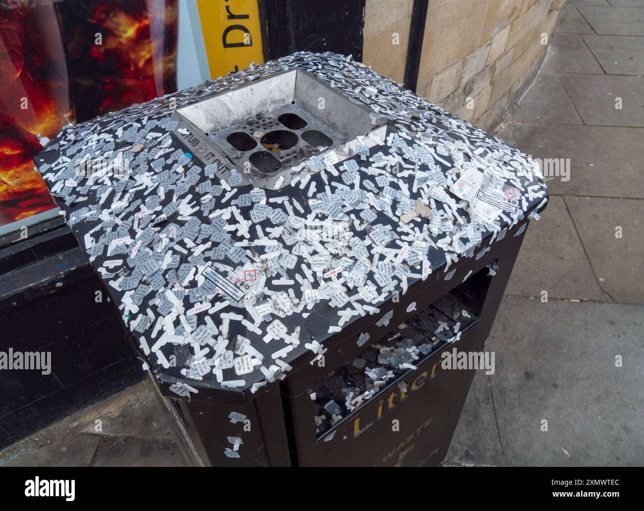 Bin covered in stickers hi-res stock photography and images - Alamy