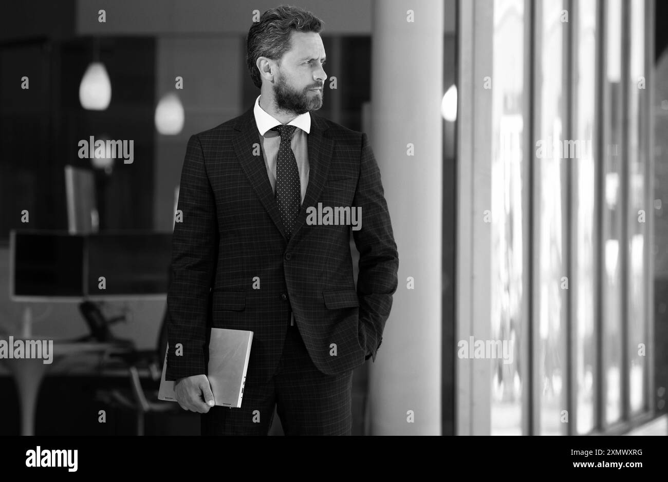 Business man standing on street Black and White Stock Photos & Images ...