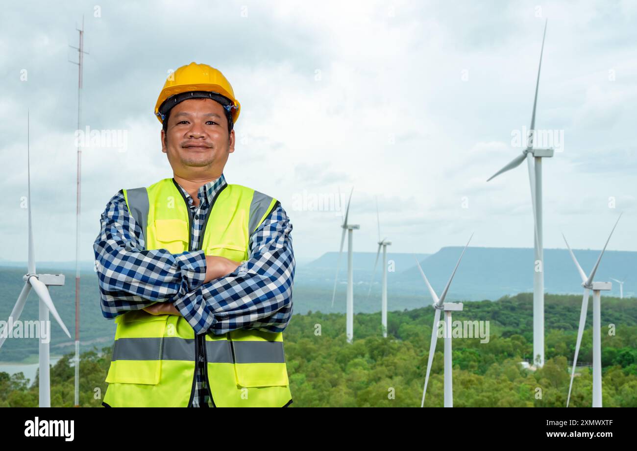 Picture of One Engineer working at windmill farm Generating electricity ...