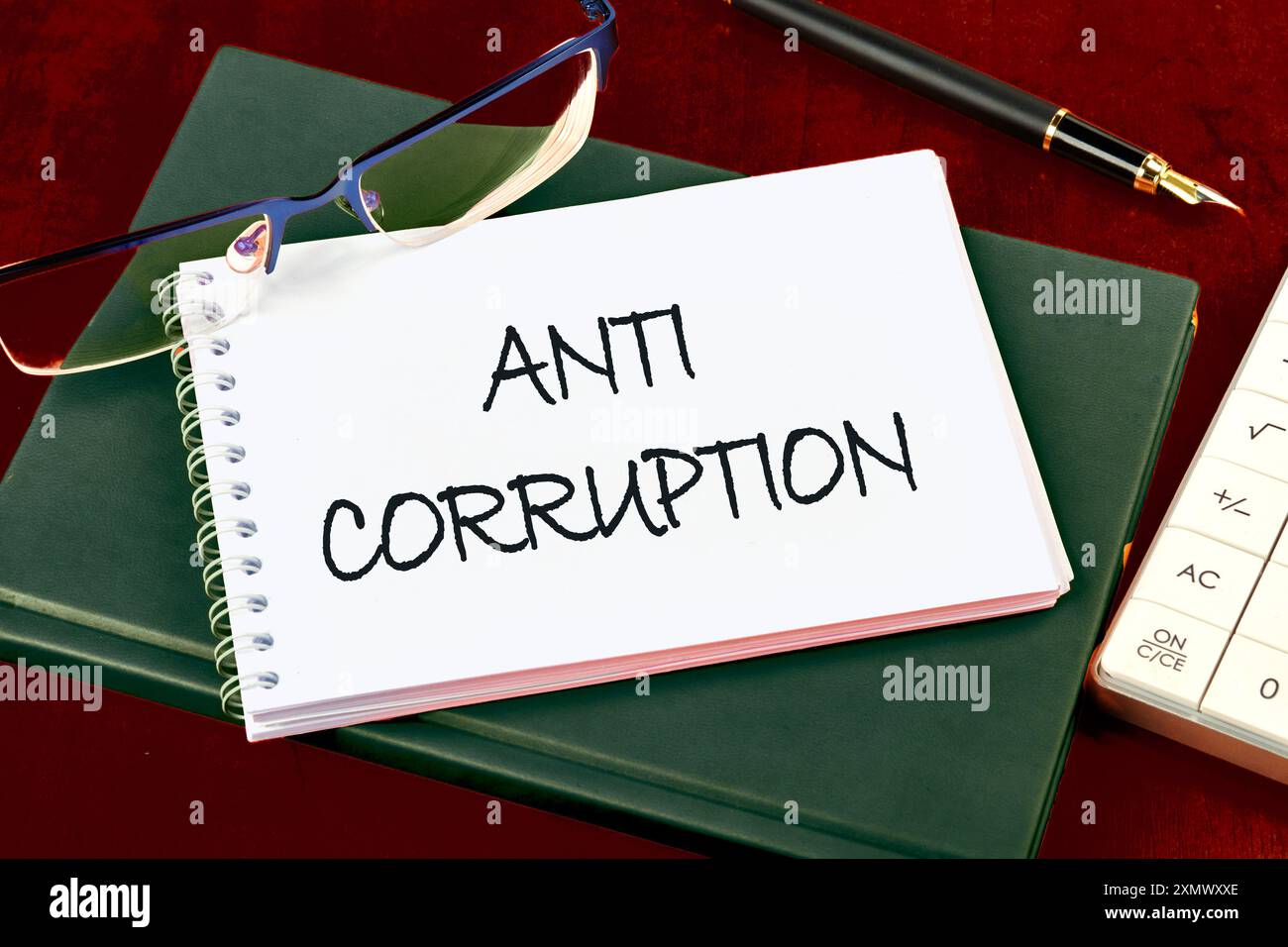 ANTI CORRUPTION word alphabet letters on a blank page of a notebook ...