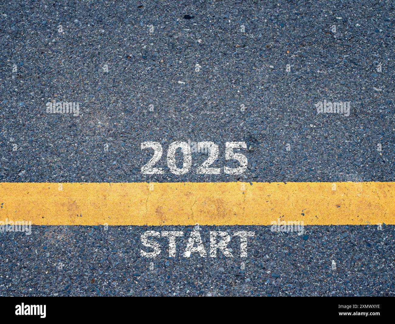 New year 2025 concept. Text 2025 written on the road in the middle of ...