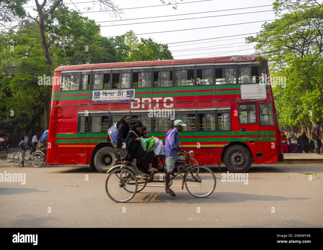 Rickshaw and double decker on the road, Dhaka Division, Dhaka ...