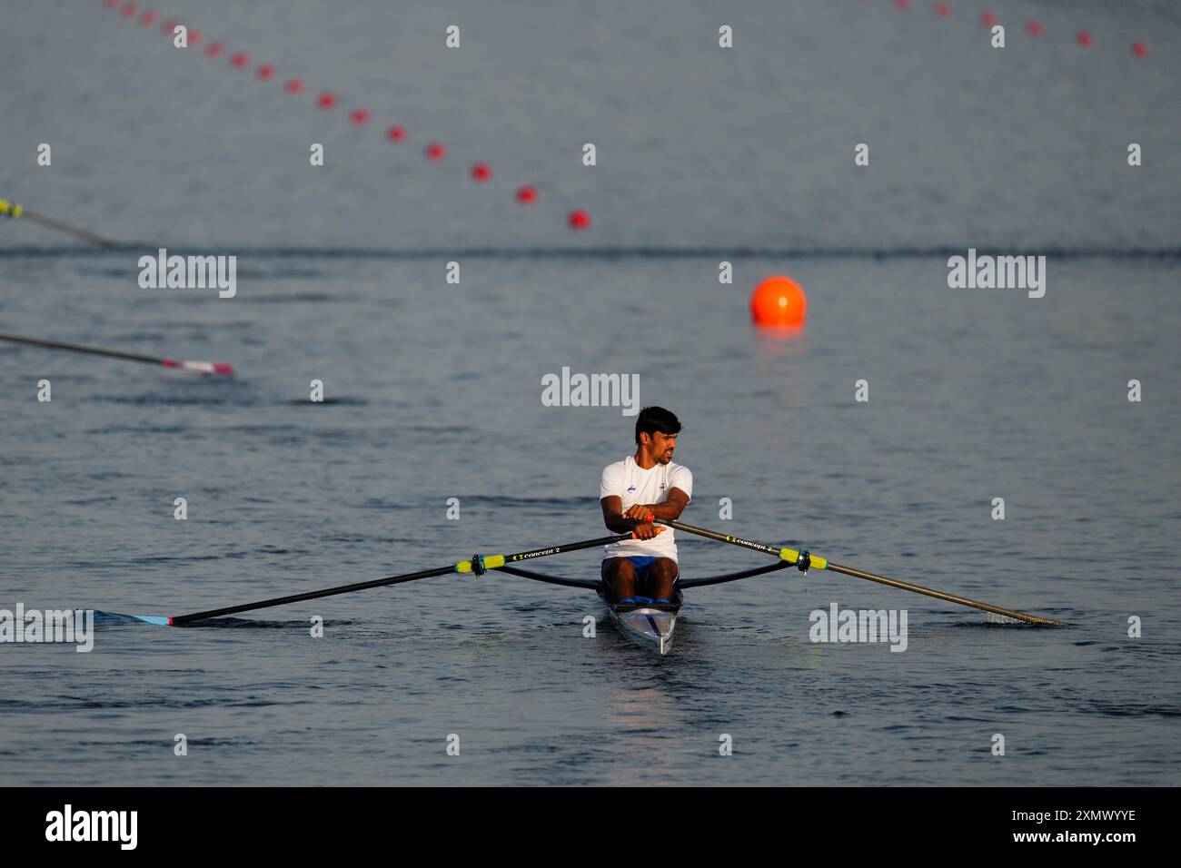 Balraj Panwar, of India, trains ahead of competing in the men's single ...
