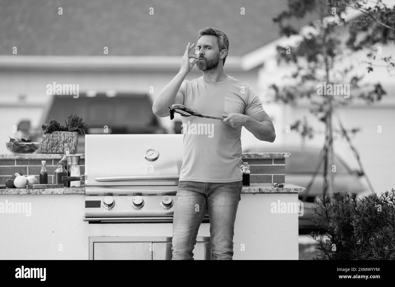 Middle aged man preparing Black and White Stock Photos & Images - Alamy