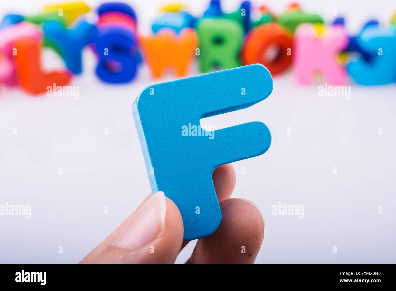 Letter cube of Fof Alphabet made of wood Stock Photo - Alamy