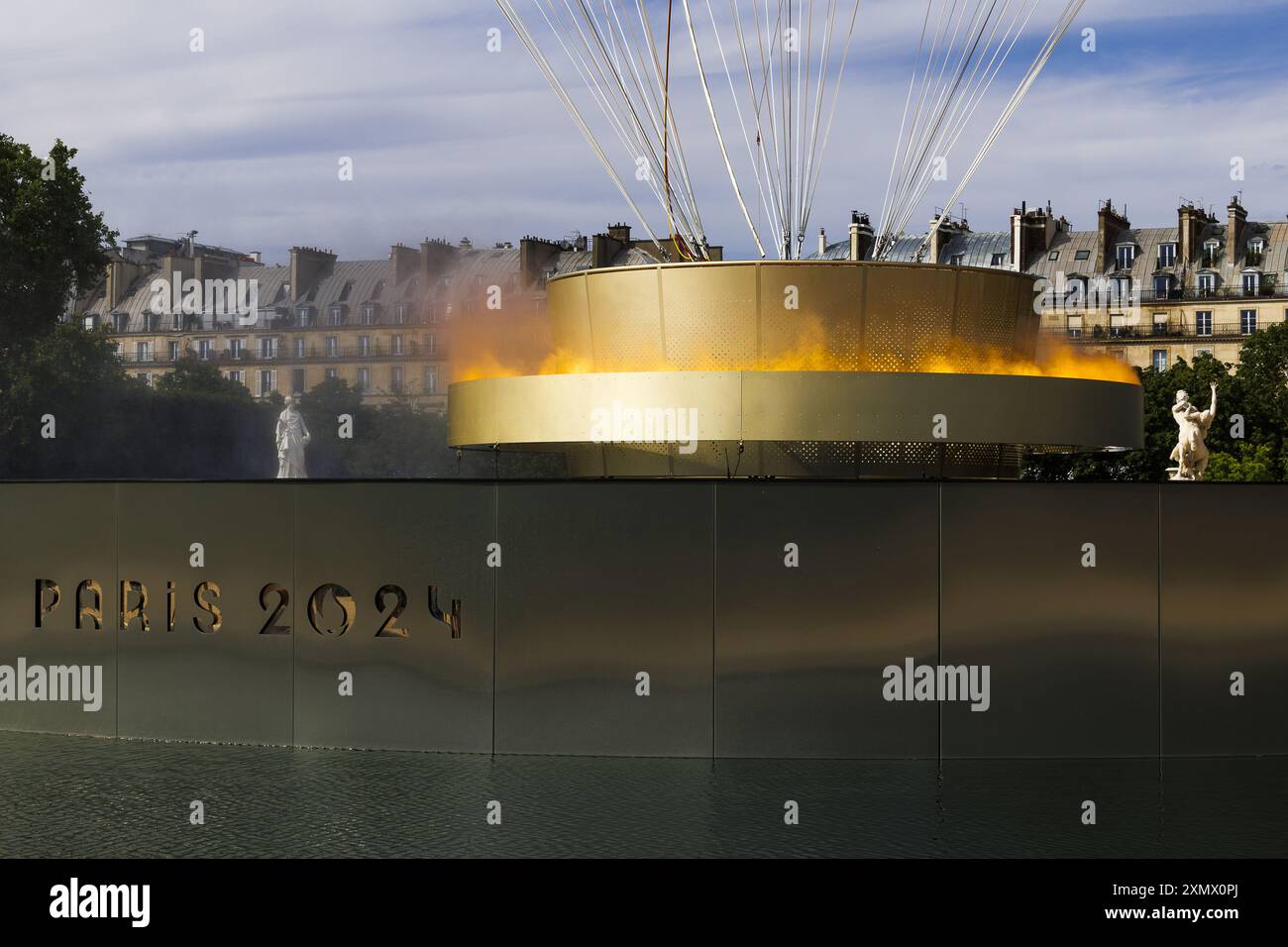 The Olympic flame cauldron, created by designer Mathieu LEHANNEUR ...