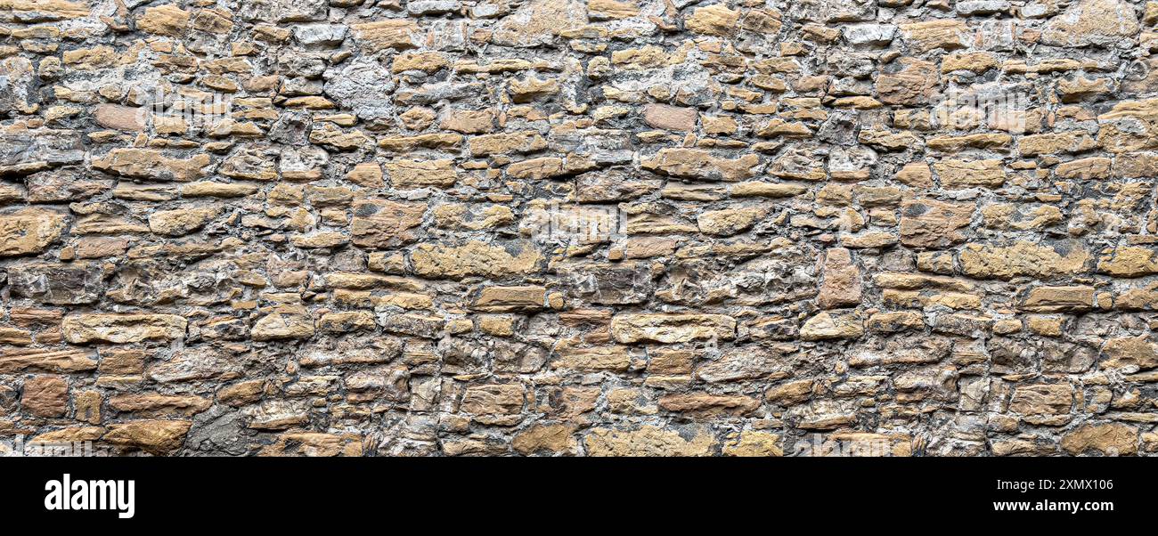 The texture of brown stone and masonry panoramic walls Stock Photo - Alamy