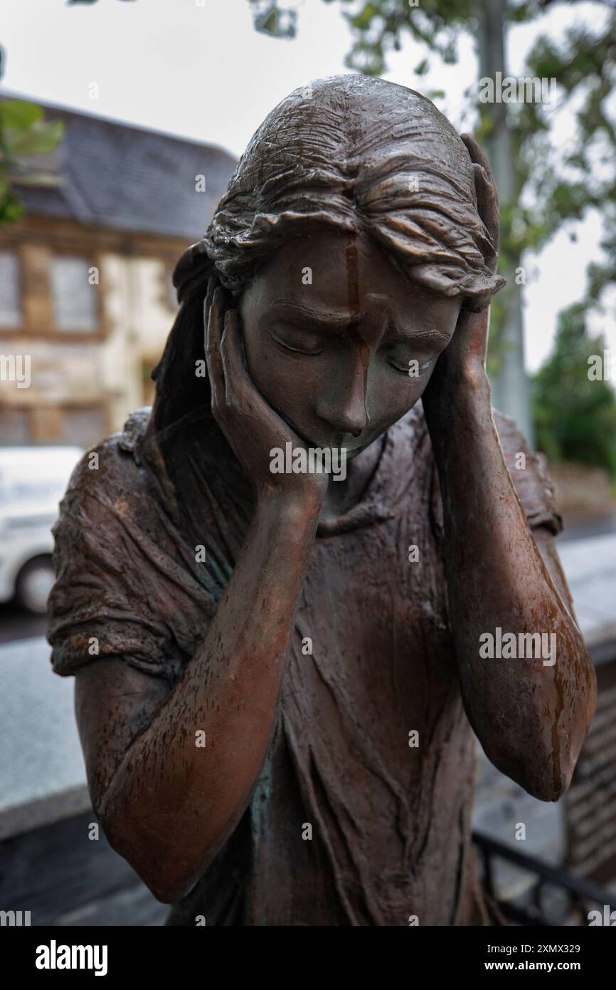 The Kneeling Girl Memorial in Claudy. Three car bombs exploded mid ...