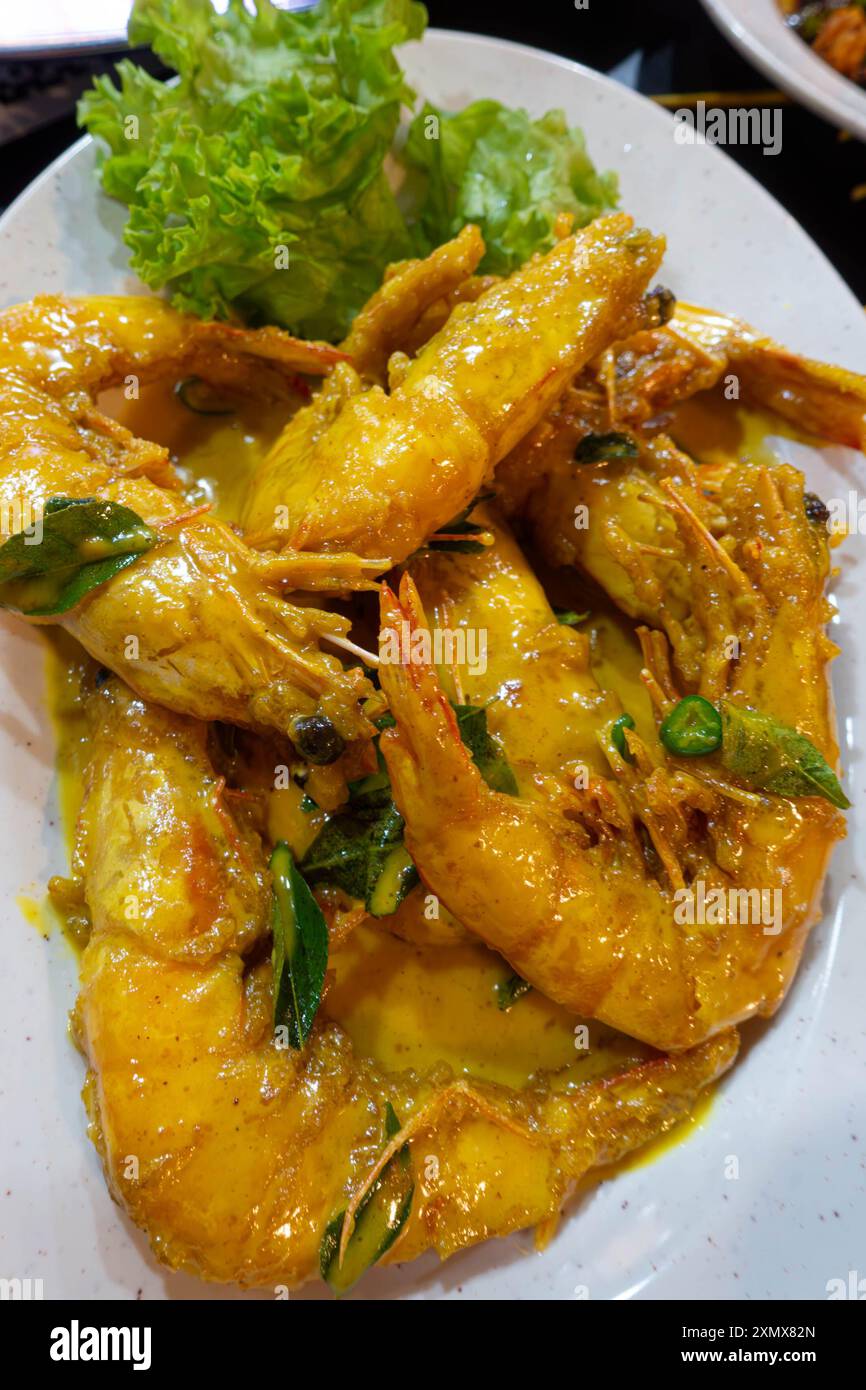 King prawns cooked in a butter sauce at a food court in Penang ...