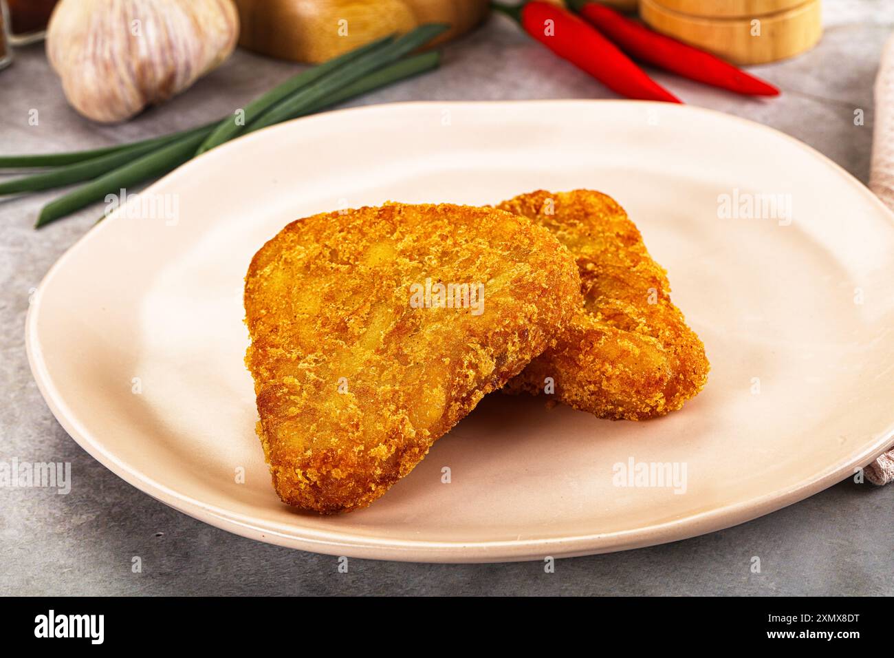 Fried potato hash brown snack for breakfast Stock Photo - Alamy