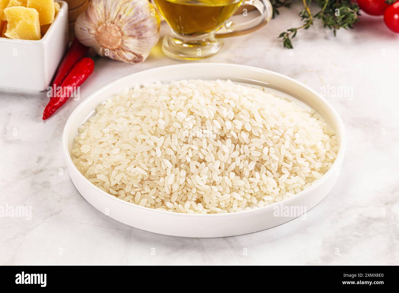 Dry raw Arborio rice for risotto Stock Photo - Alamy