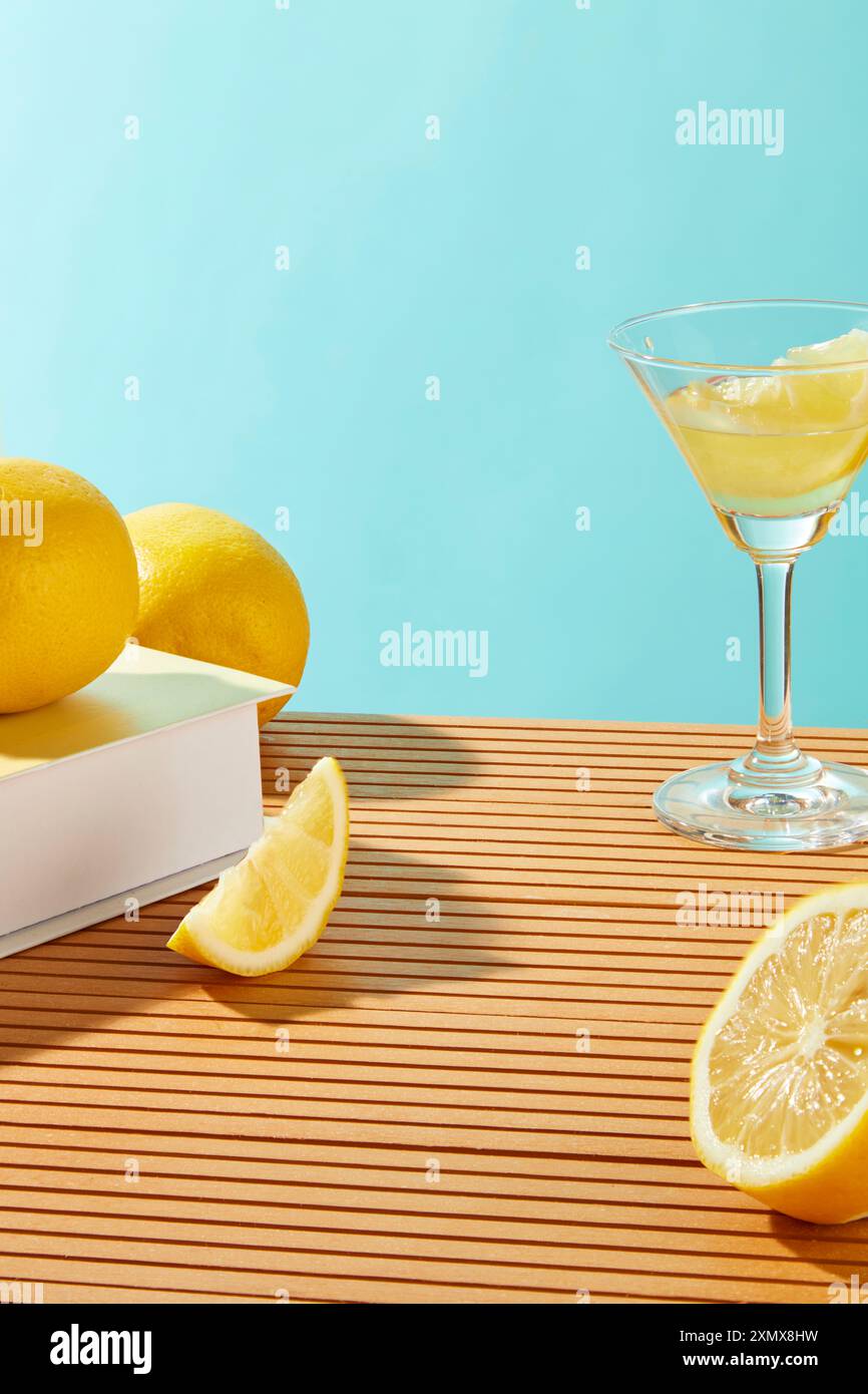 Front view at lemon theme photography on baby blue background, a white ...