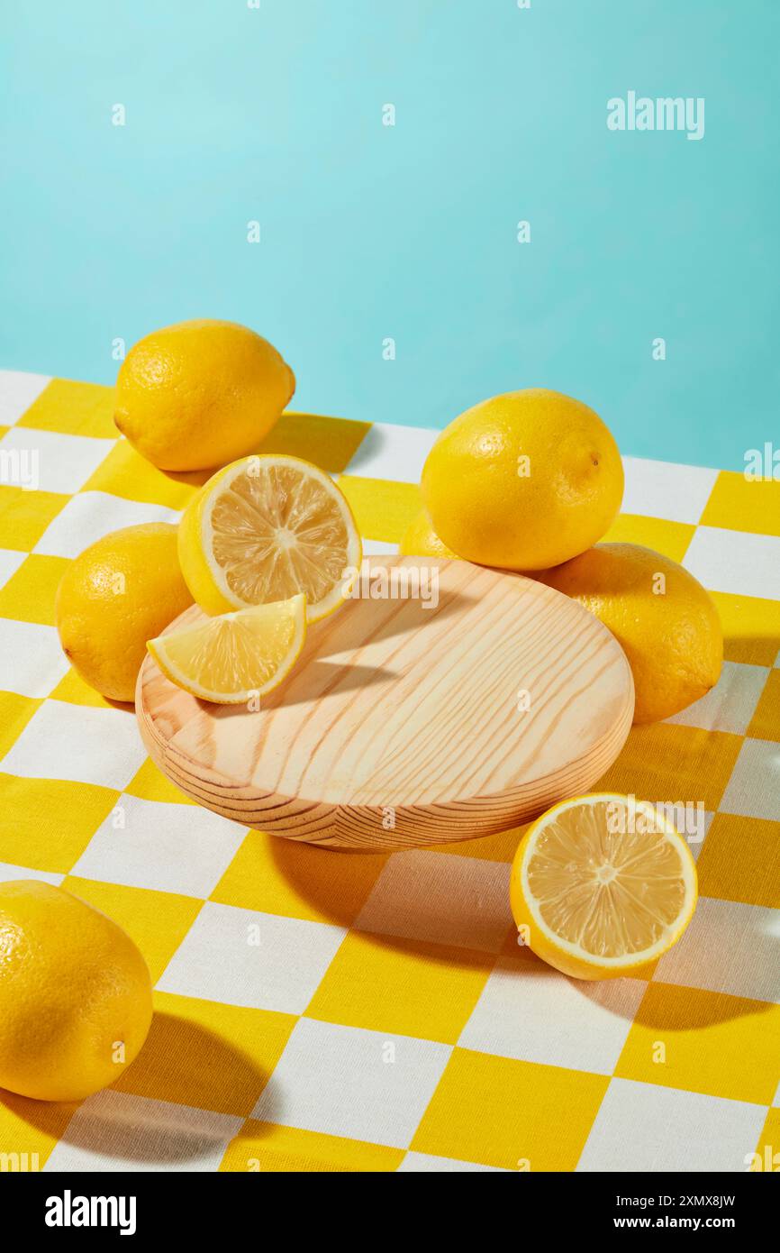 Vertical photo of lemon theme, yellow checkered flat with a blank round ...