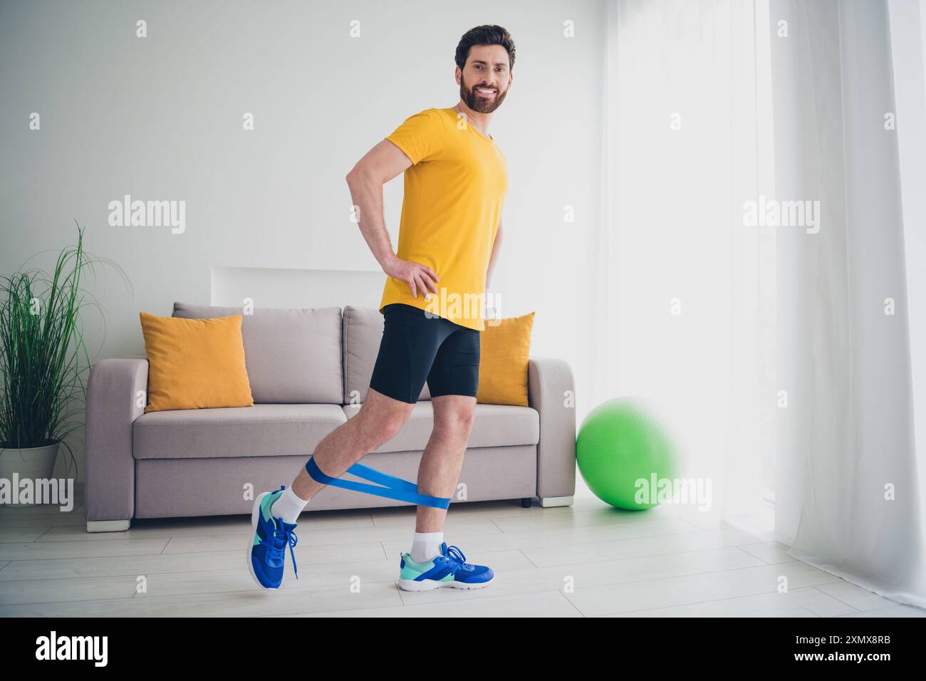 Photo of athletic strong man wear sportswear doing physical exercises ...