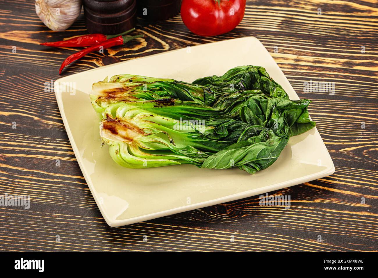 Asian grilled Pak Choy salad snack Stock Photo - Alamy