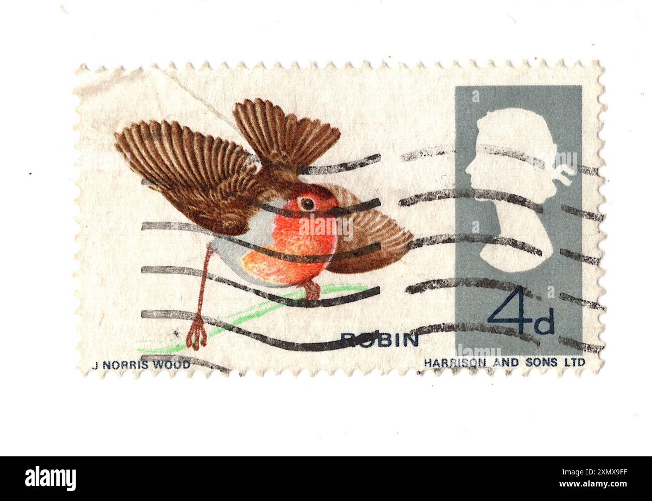 A vintage Queen Elizabeth II postage stamp featuring a robin on a white ...