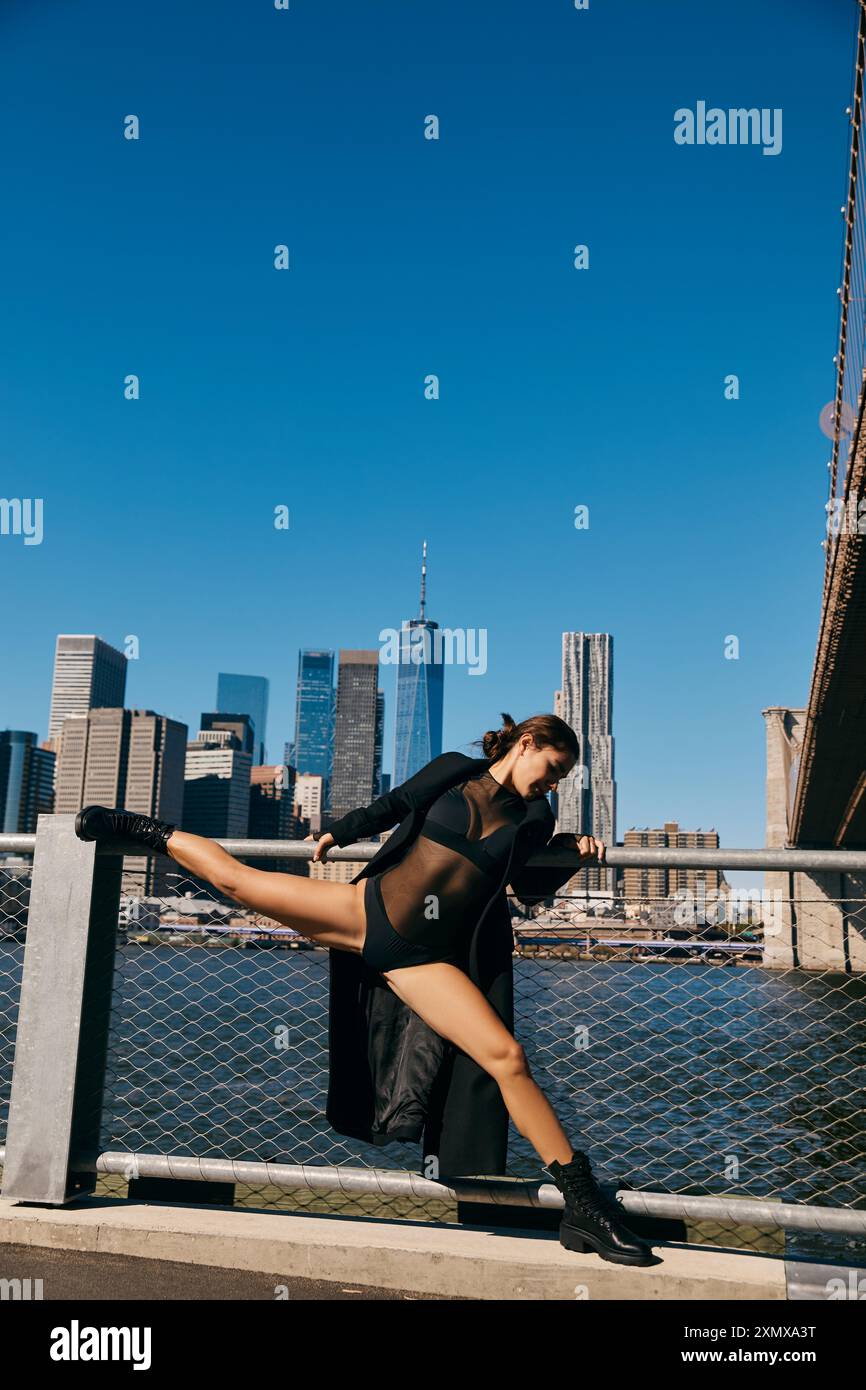 Woman in black bodysuit hi-res stock photography and images - Alamy