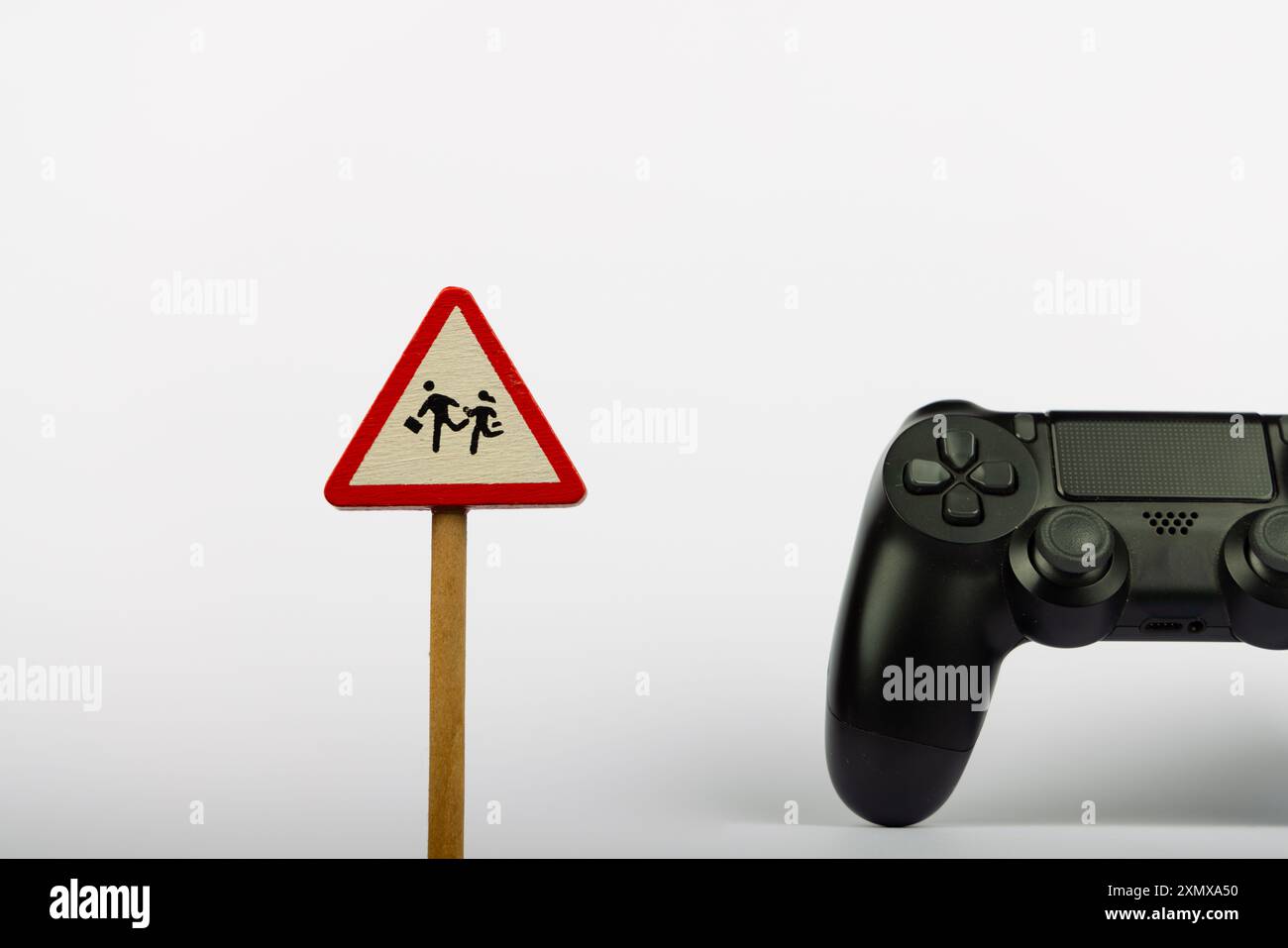 A wooden sign reading "WARNINGS CHILDS" with a game controller, set ...