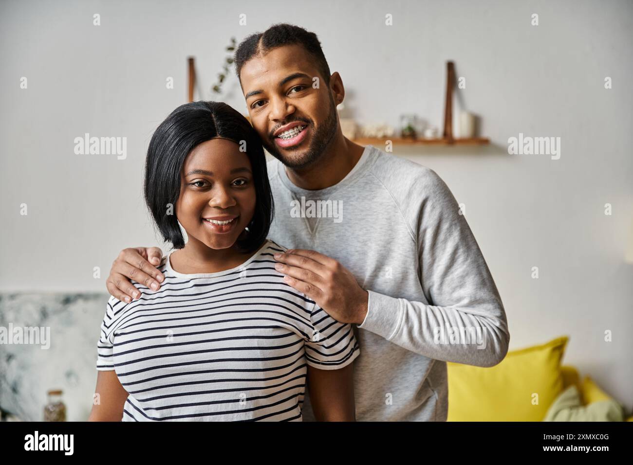 A portrait of a happy African American couple spending time together in their home Stock Photo ...